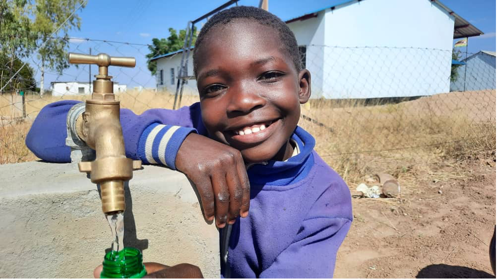 School Piped water system brings smiles to children in Mangwe | Zimbabwe | World Vision ...